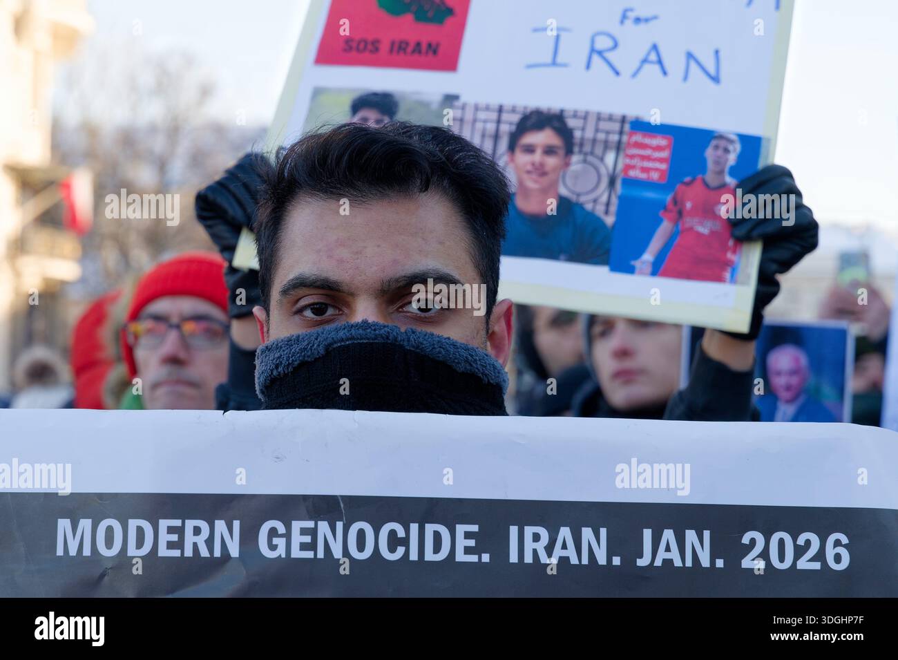 Warsaw, Poland, 17th Jan., 2026. Masked protester bolding a banner ...