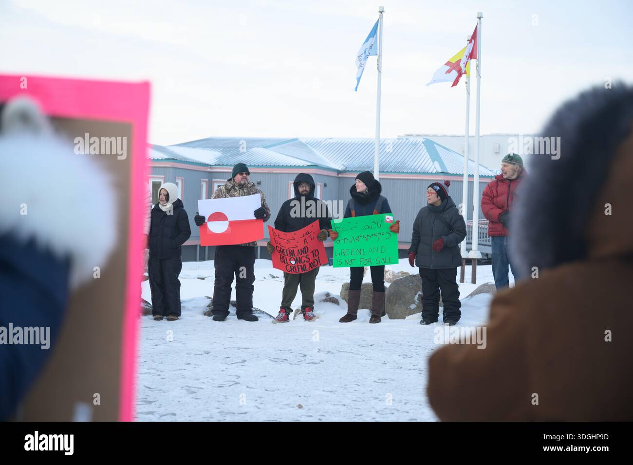 Iqaluit, Canada. 17th Jan, 2026. Iqaluit residents gather outside the ...