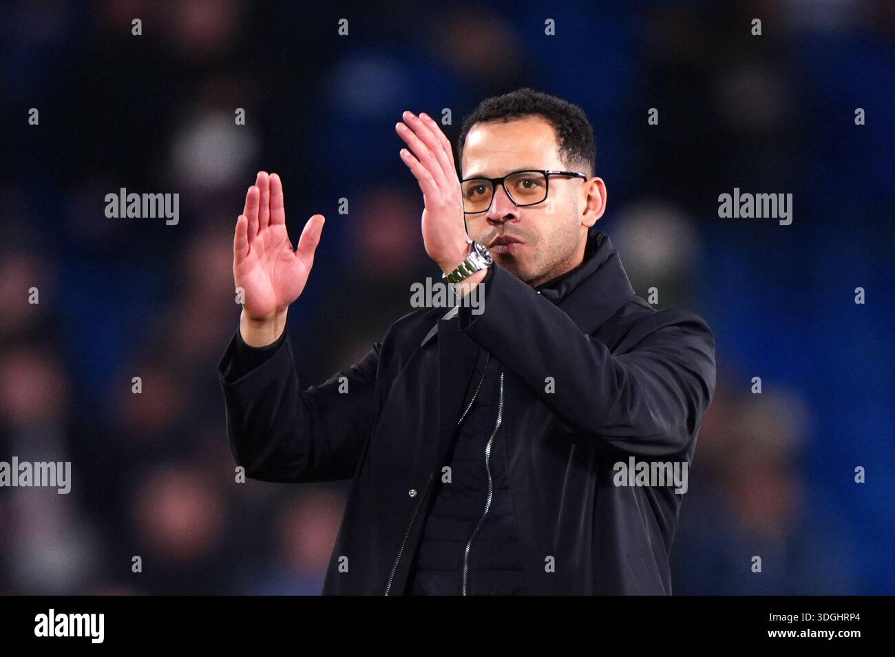 Chelsea manager Liam Rosenior applauds the fans following the Premier ...