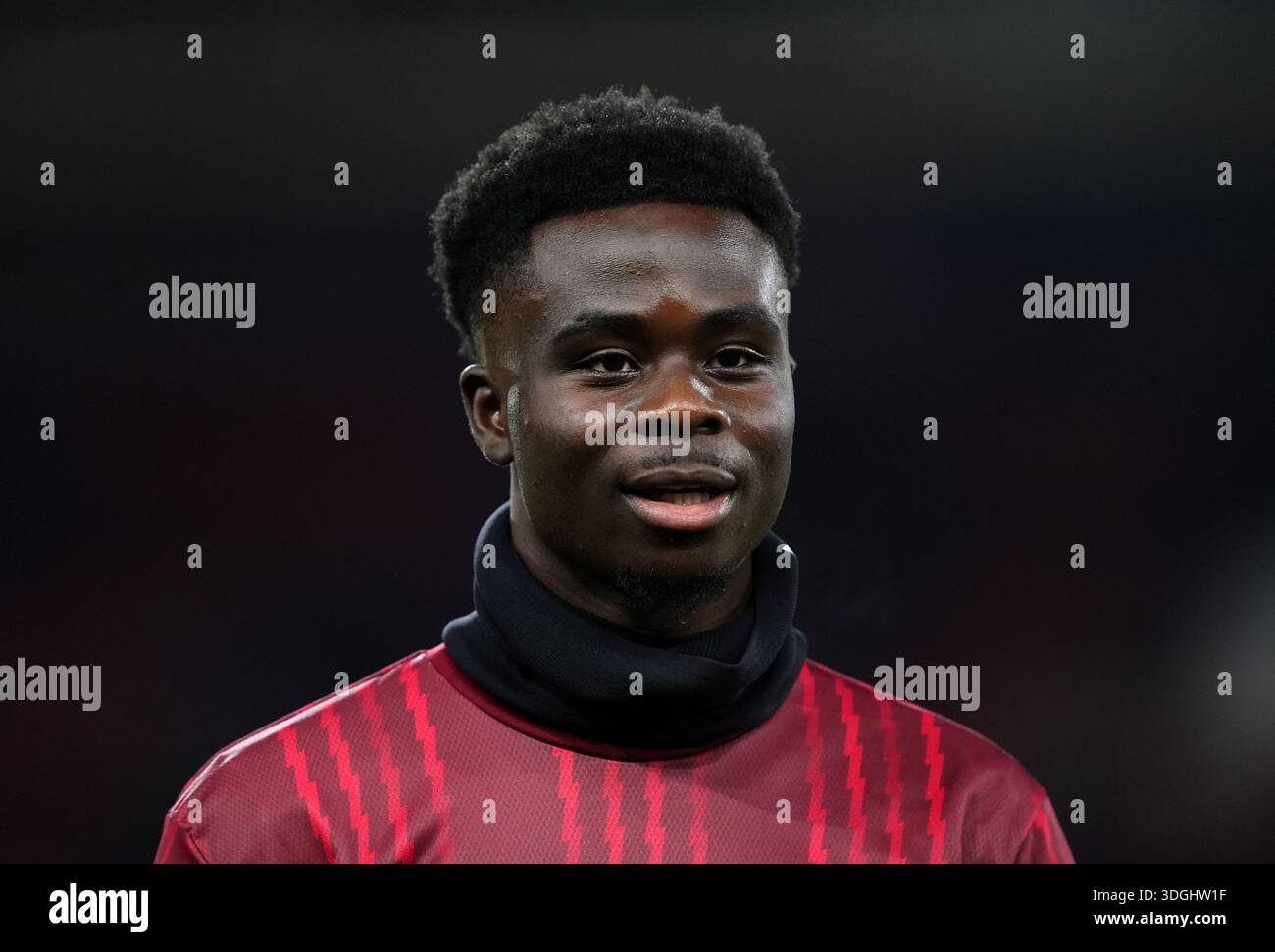 Arsenal's Bukayo Saka warming up ahead of the Premier League match at ...