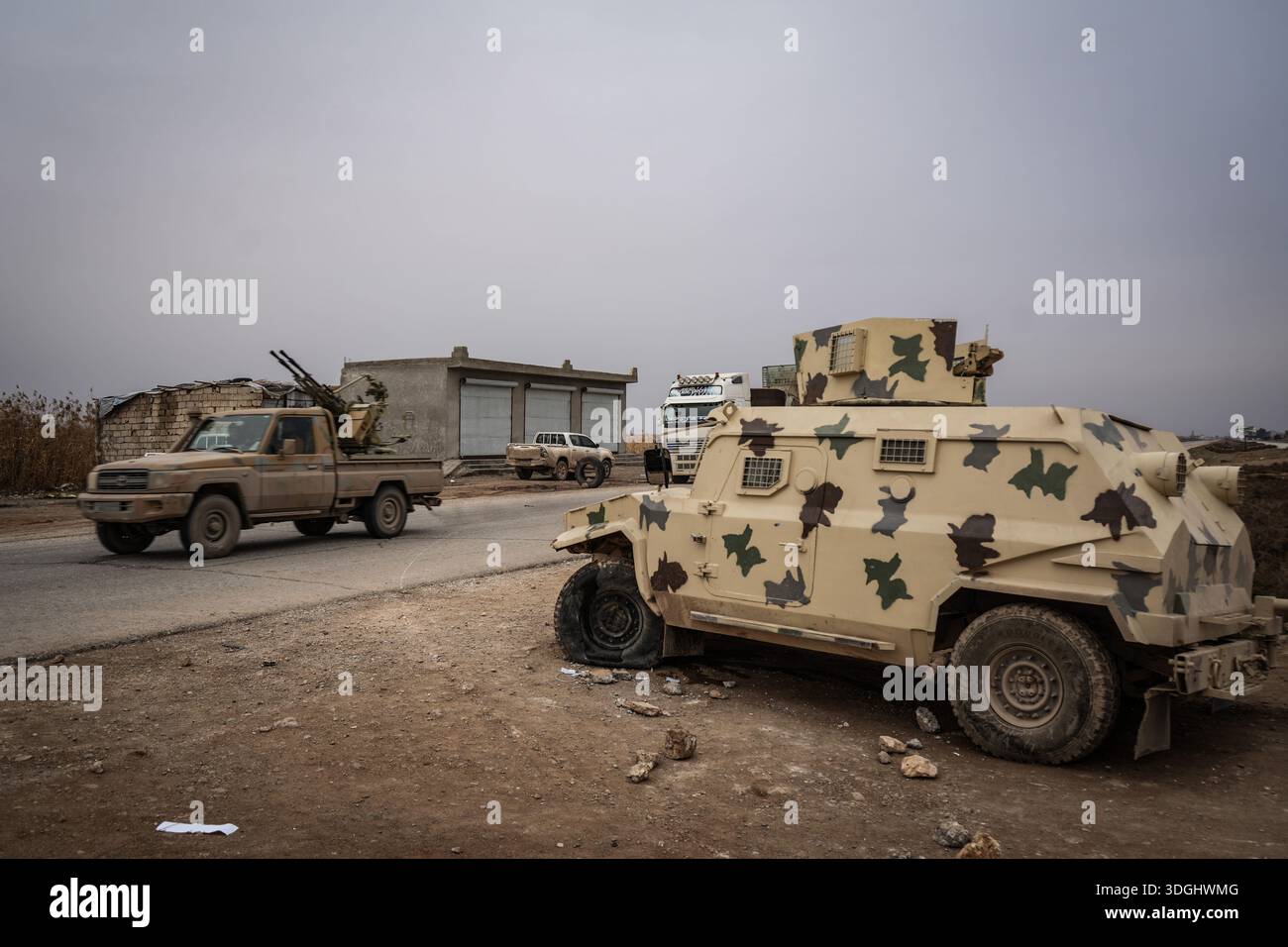 Ar Raqqah, Syria. 17th Jan, 2026. Syrian military forces pass by Syrian ...