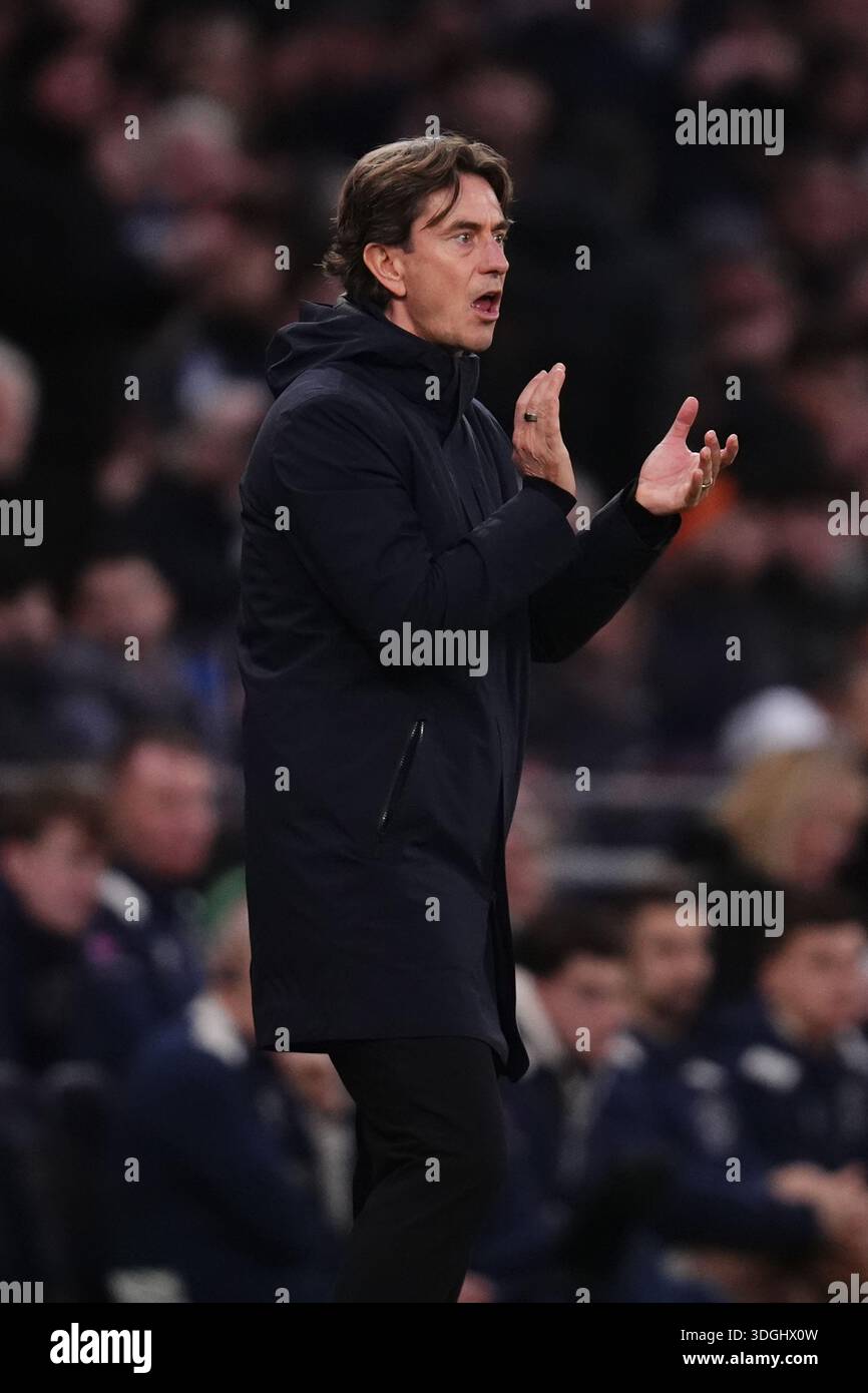 Tottenham Hotspur manager Thomas Frank claps on the touchline during ...