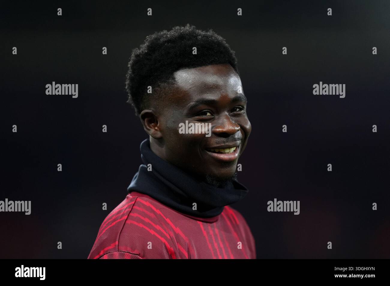 Arsenal's Bukayo Saka warming up ahead of the Premier League match at ...
