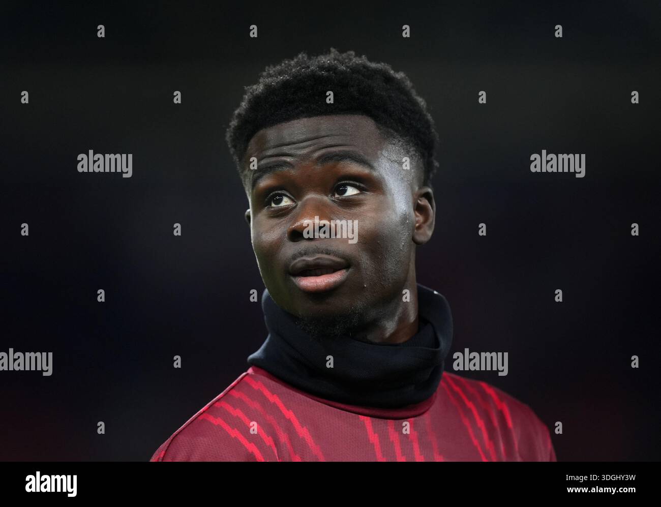 Arsenal's Bukayo Saka warming up ahead of the Premier League match at ...
