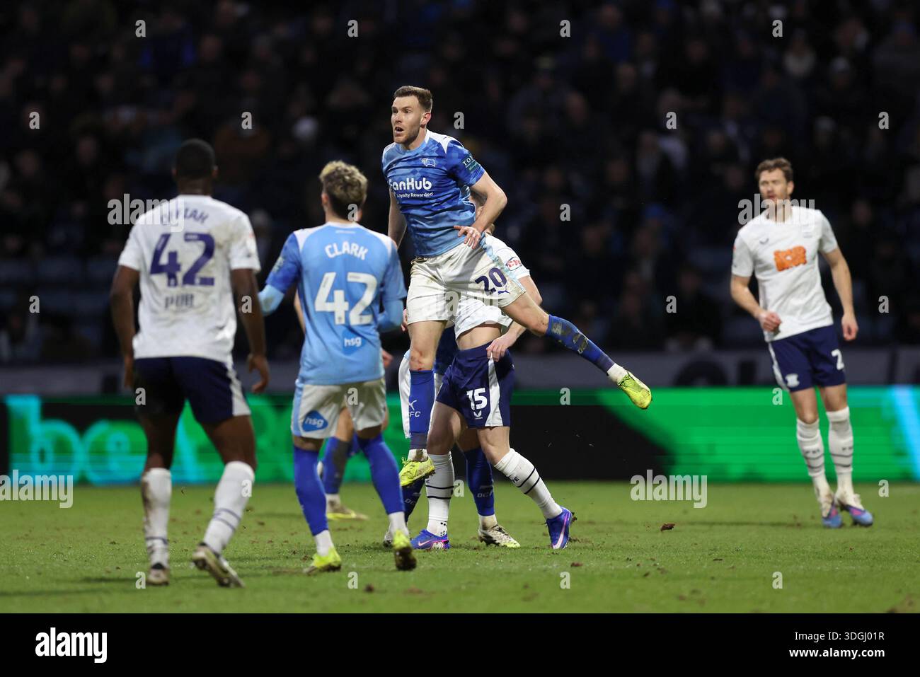 Derby County's Callum Elder (centre) battles for the ball during the ...