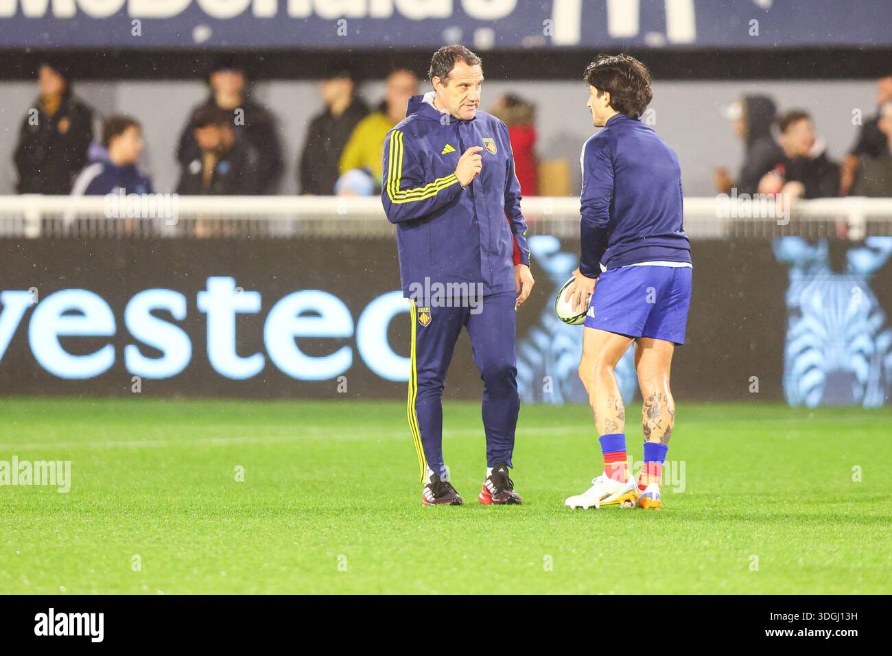 Laurent LABIT head coach of Perpignan with Gela APARIDZE of Perpignan ...