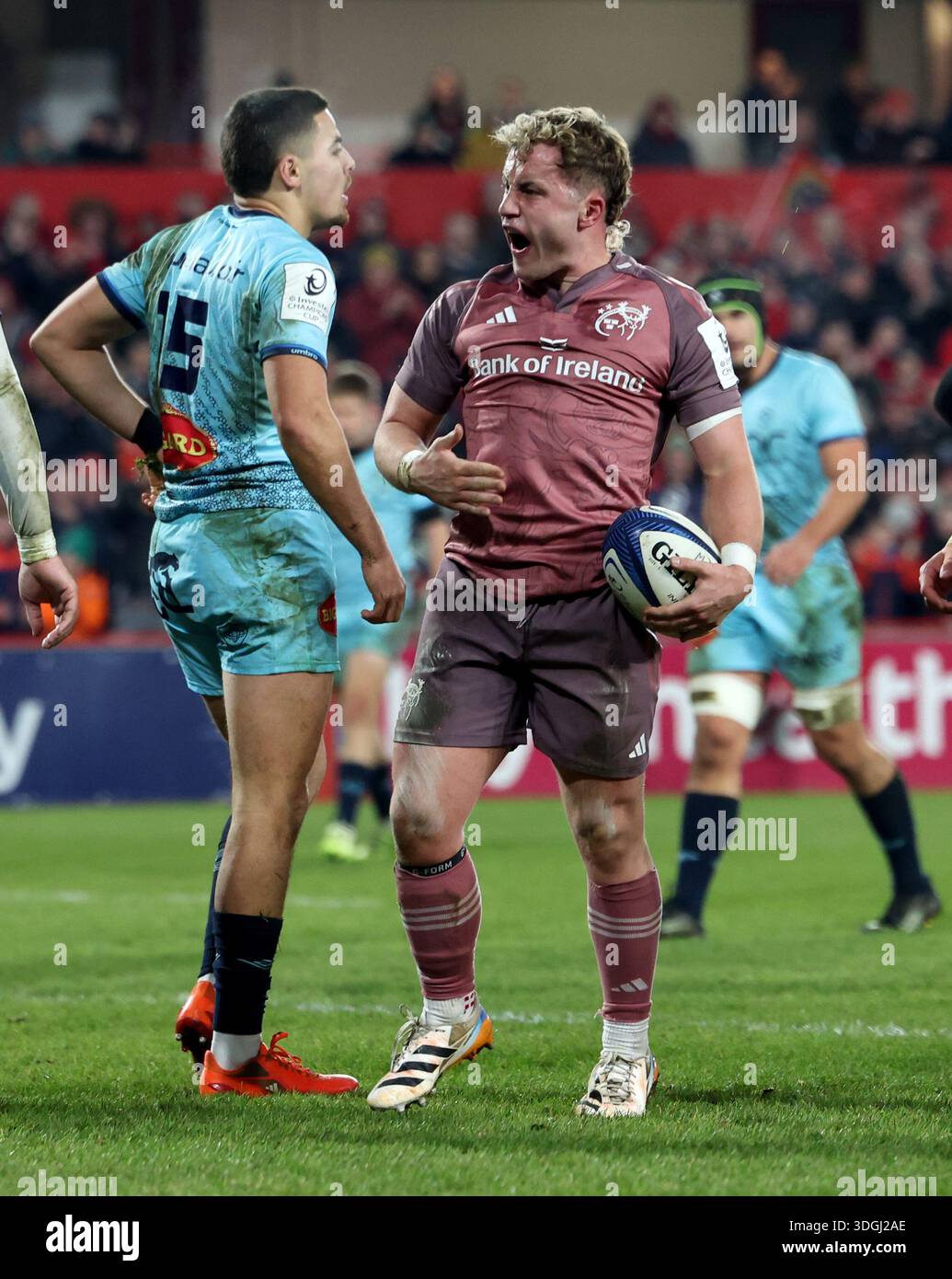 Munster Rugby's Craig Casey (right) celebrates after scoring his sides ...