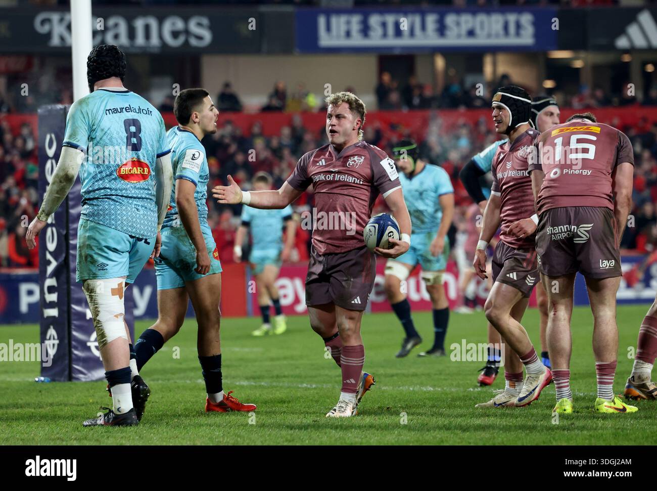Munster Rugby's Craig Casey (centre) celebrates after scoring his sides ...