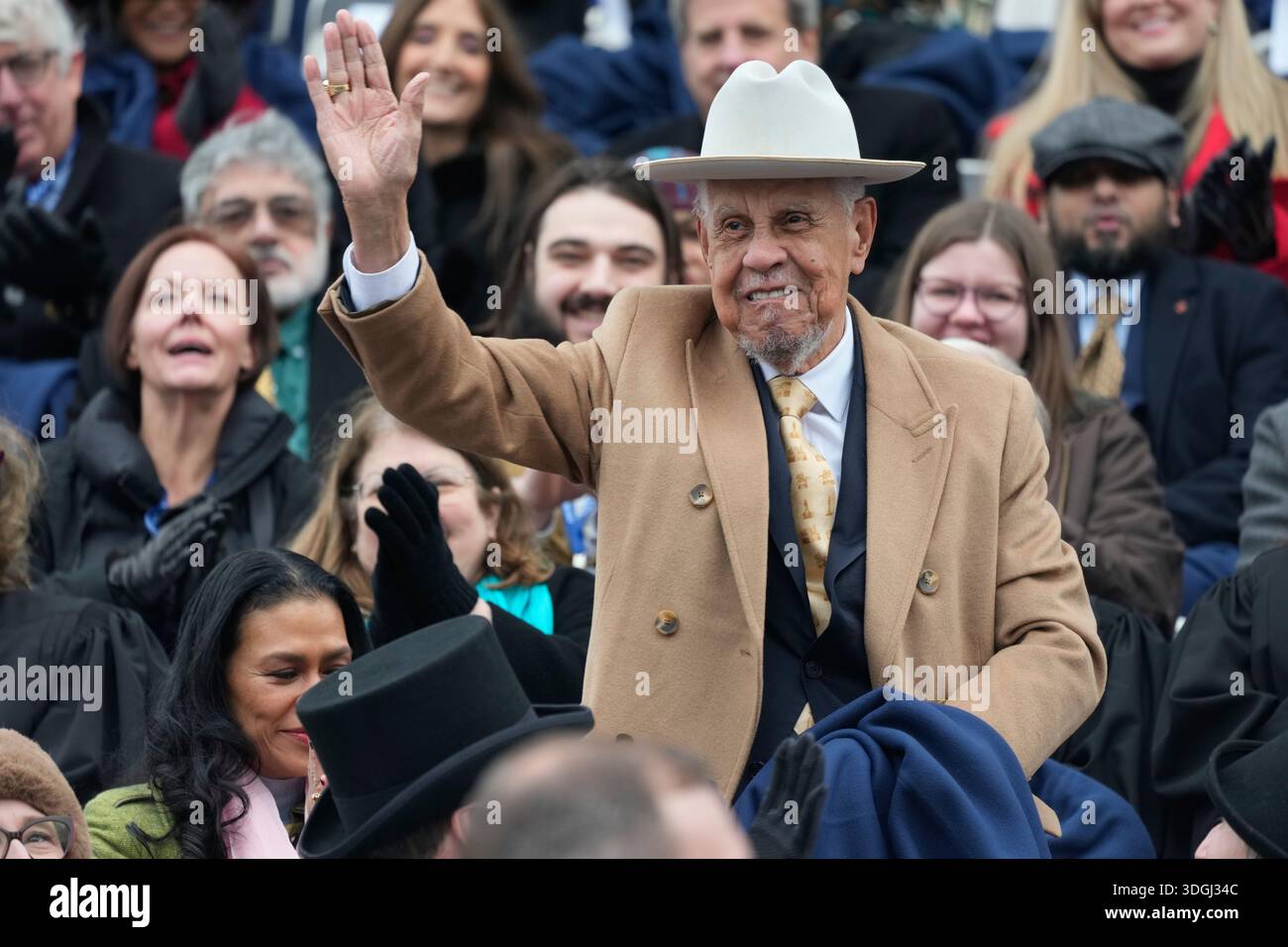 Former Gov. Douglas Wilder waves during Virginia Gov. Abigail ...