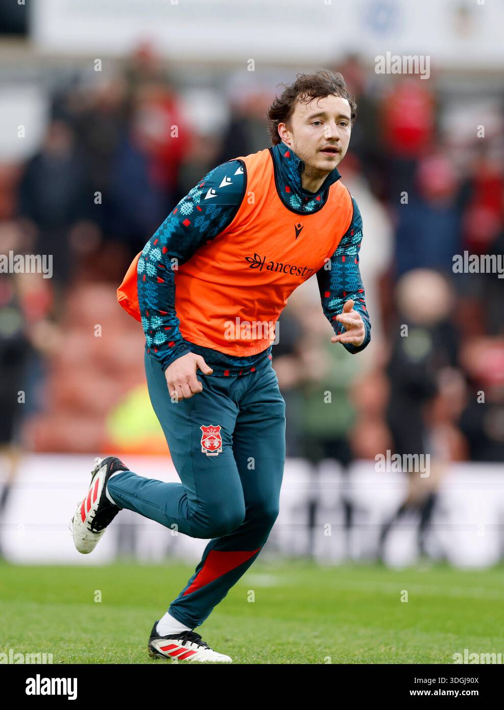 Wrexham's Oliver Rathbone warms up ahead of the Sky Bet Championship ...
