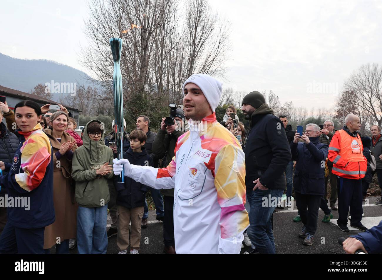 Brescia, Italy. 17th Jan, 2026. Iseo Olympic torchlight procession ...