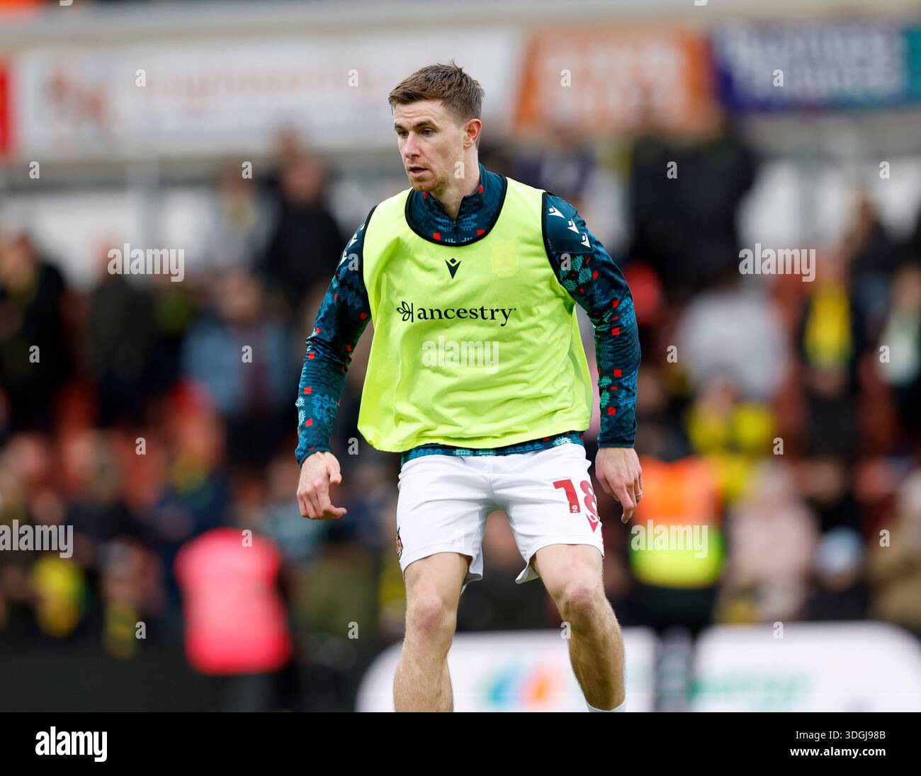Wrexham's Ben Sheaf warms up ahead of the Sky Bet Championship match at ...