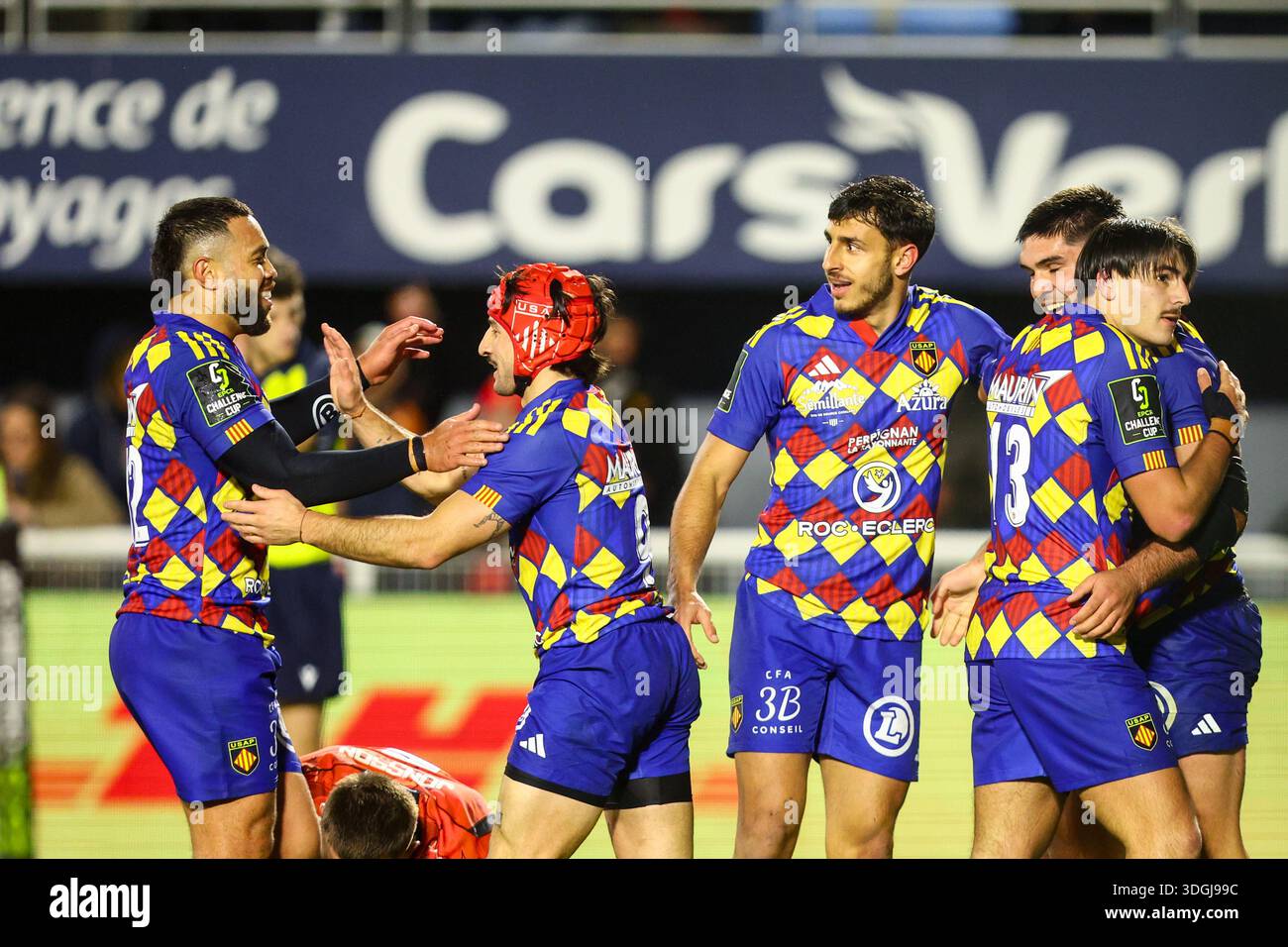 Joaquim OVIEDO of Perpignan celebrates his try with teammates during ...