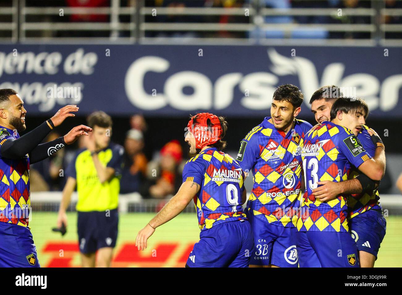 Joaquim OVIEDO of Perpignan celebrates his try with teammates during ...
