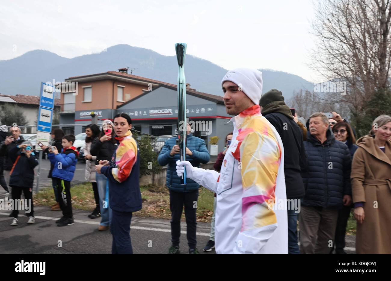 Brescia, Italy. 17th Jan, 2026. Iseo Olympic torchlight procession ...