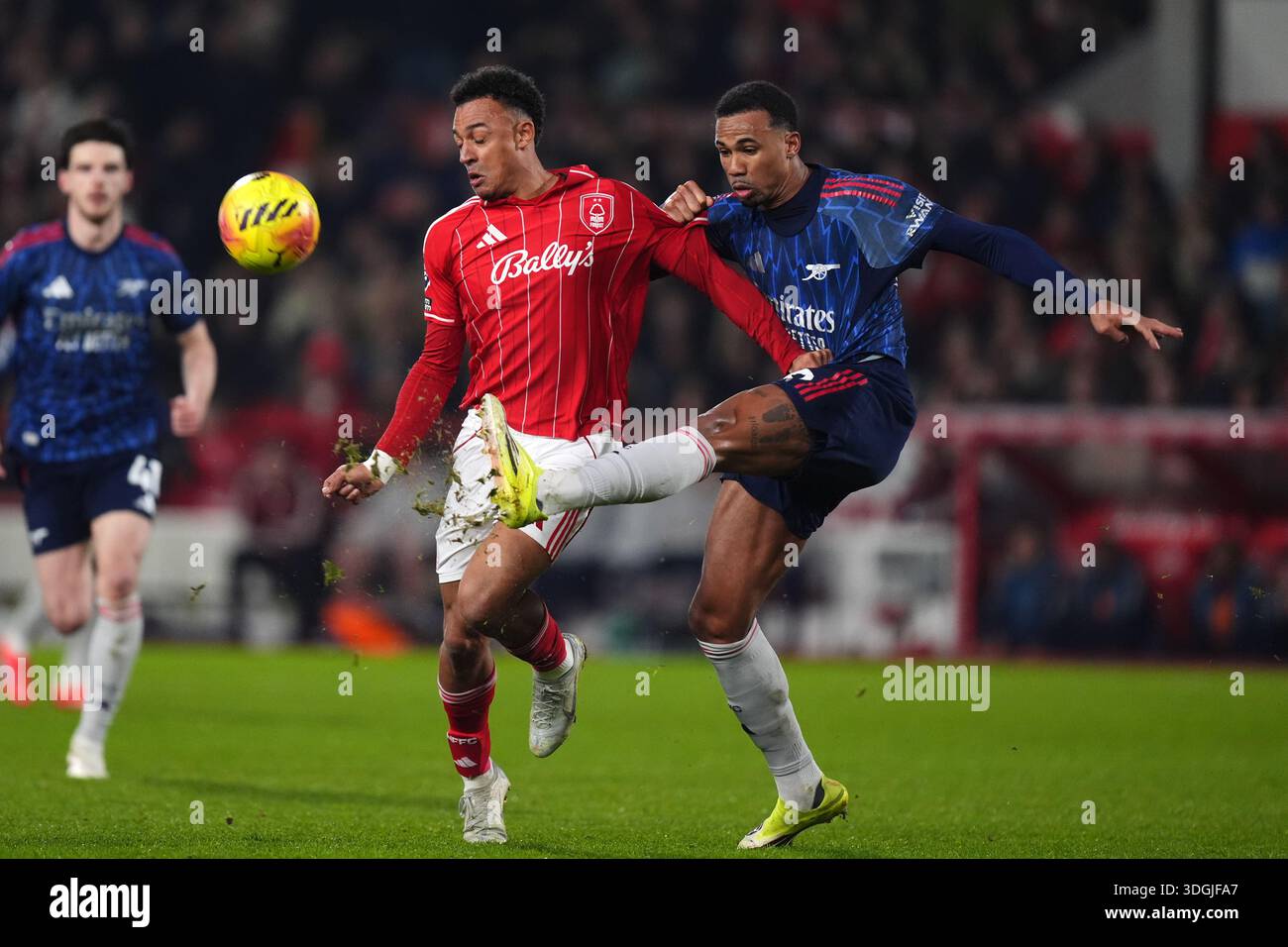 Nottingham Forest's Dan Ndoye and Arsenal's Gabriel battle for the ball ...