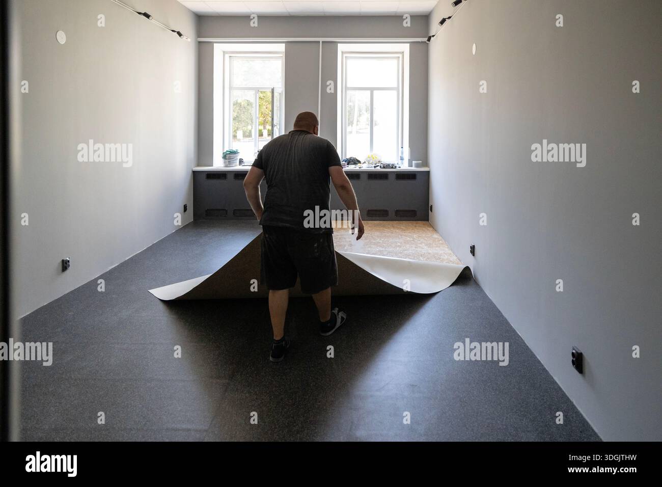 A craftsman in a rural community completes the final stage of an ...