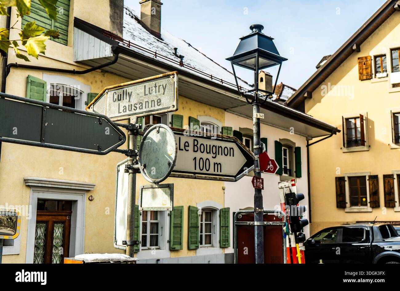 Road signs pointing toward town hi-res stock photography and images - Alamy