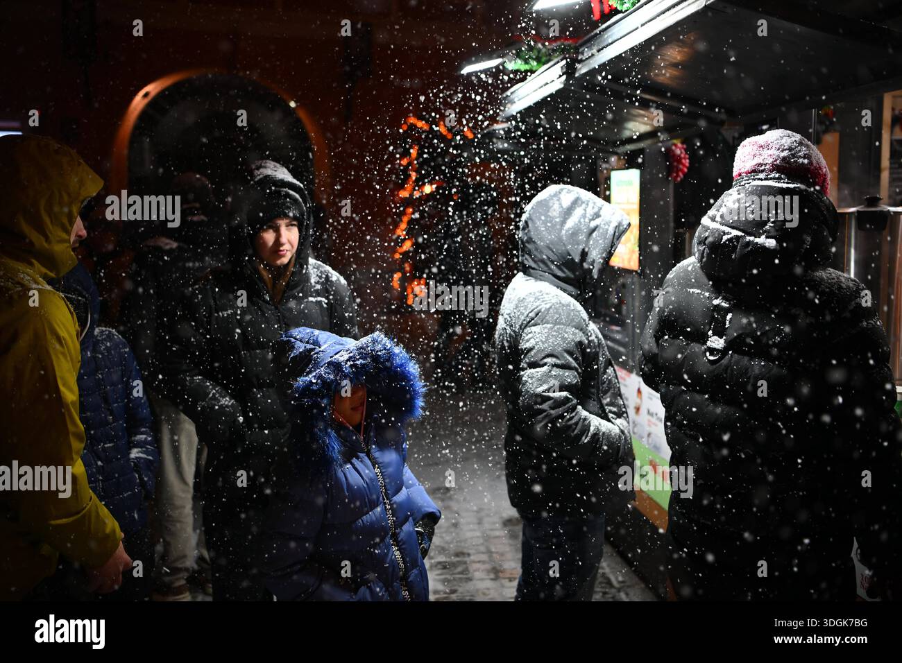 BRASOV, winter People enjoy the snow in Piata Sfatului in Brasov ...