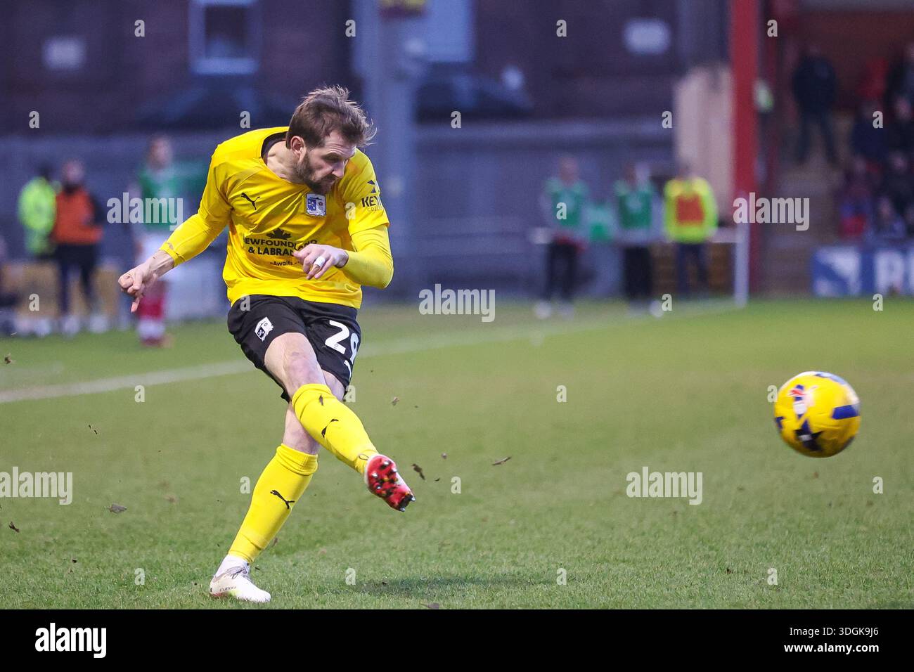 Tom Barkhuizen fires the ball to the centre during the Sky Bet League 2 ...