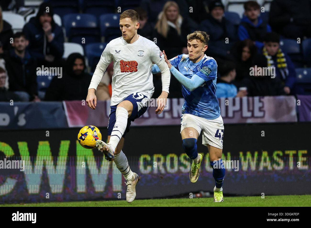 Preston North End's Lewis Gibson and Derby County's Bobby Clark during ...