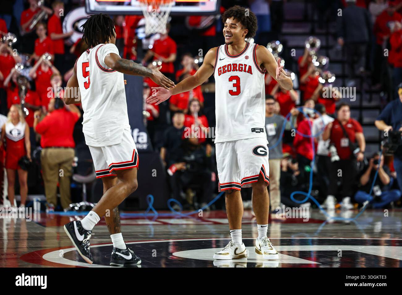 Georgia guards Jeremiah Wilkinson (5) and Jordan Ross (3) react after ...
