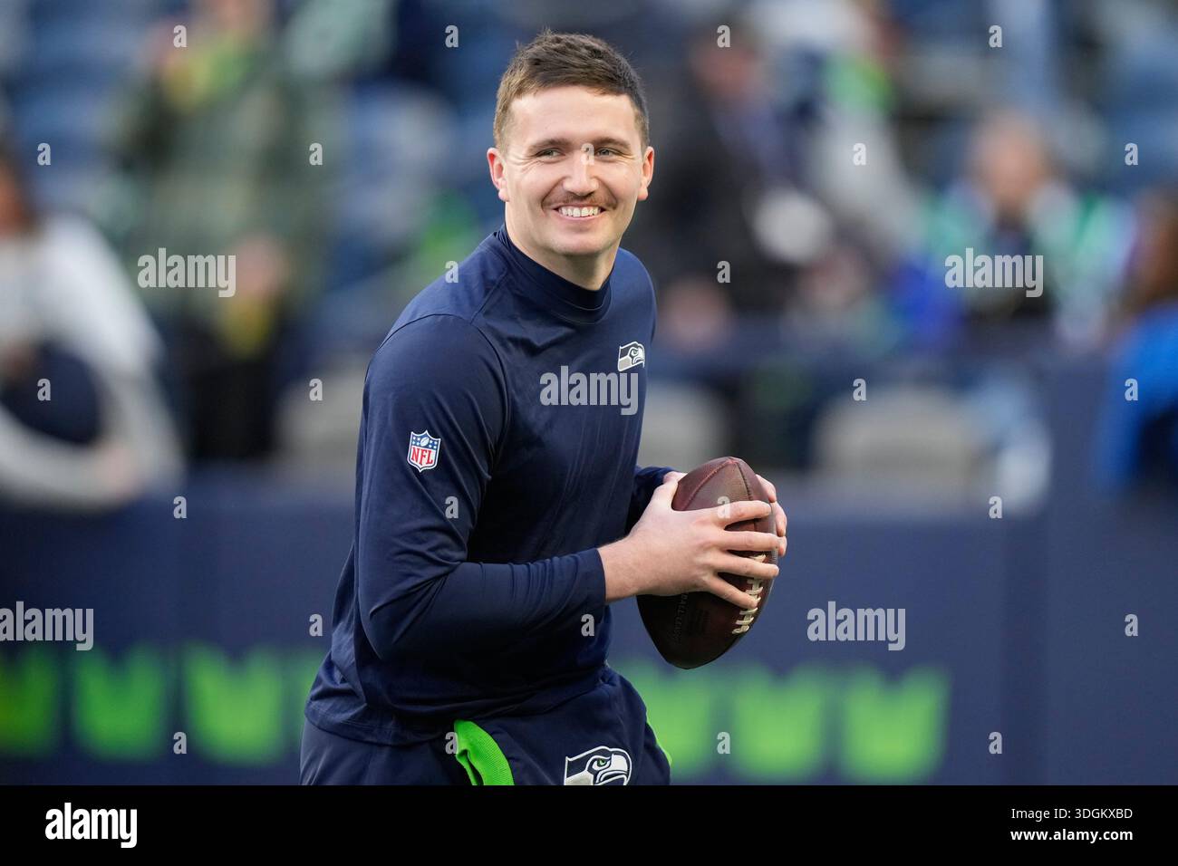 Seattle Seahawks quarterback Drew Lock warms up before an NFL football ...