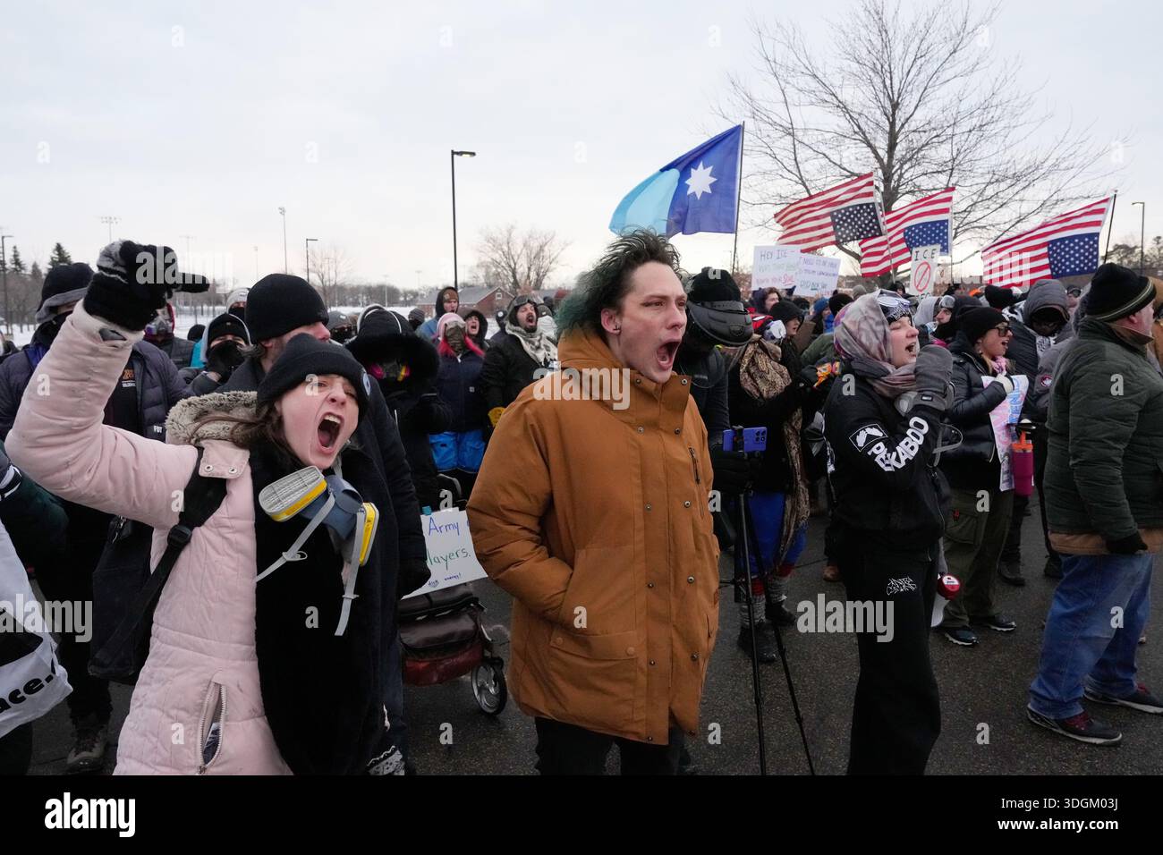 Protesters shout at federal law enforcement outside the Bishop Henry ...