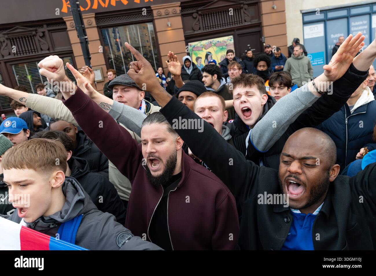 Protester changing football slogans. Chelsea supporters gathered ...