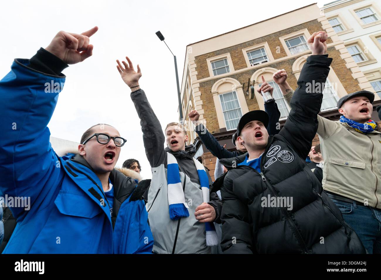 Protester changing football slogans. Chelsea supporters gathered ...