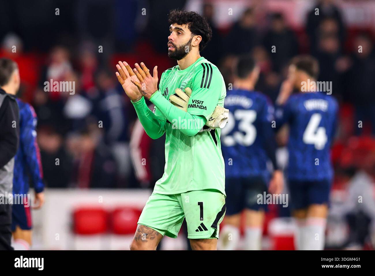 David Raya of Arsenal applauds the travelling fans after the Nottingham ...