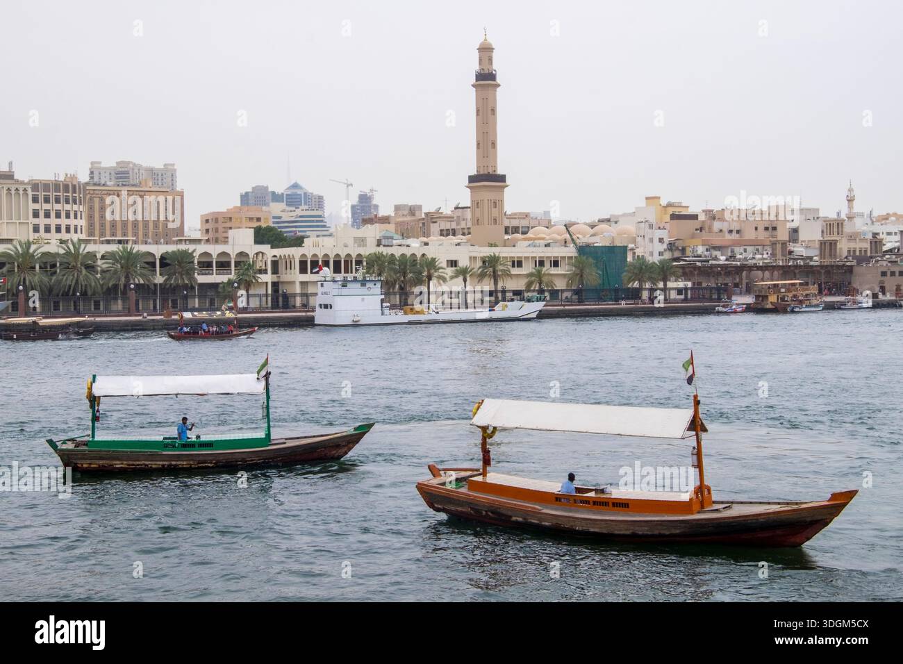UAE, Dubai, Dubai Creek. The traditional wooden boat shown in the image ...
