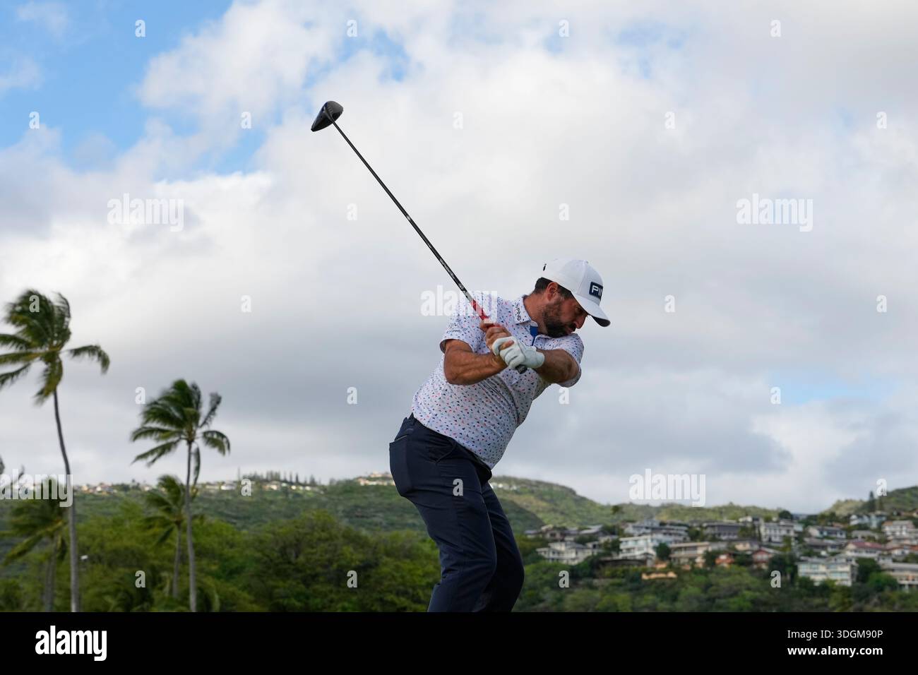John Parry, of England, hits from the 14th tee during the third round ...