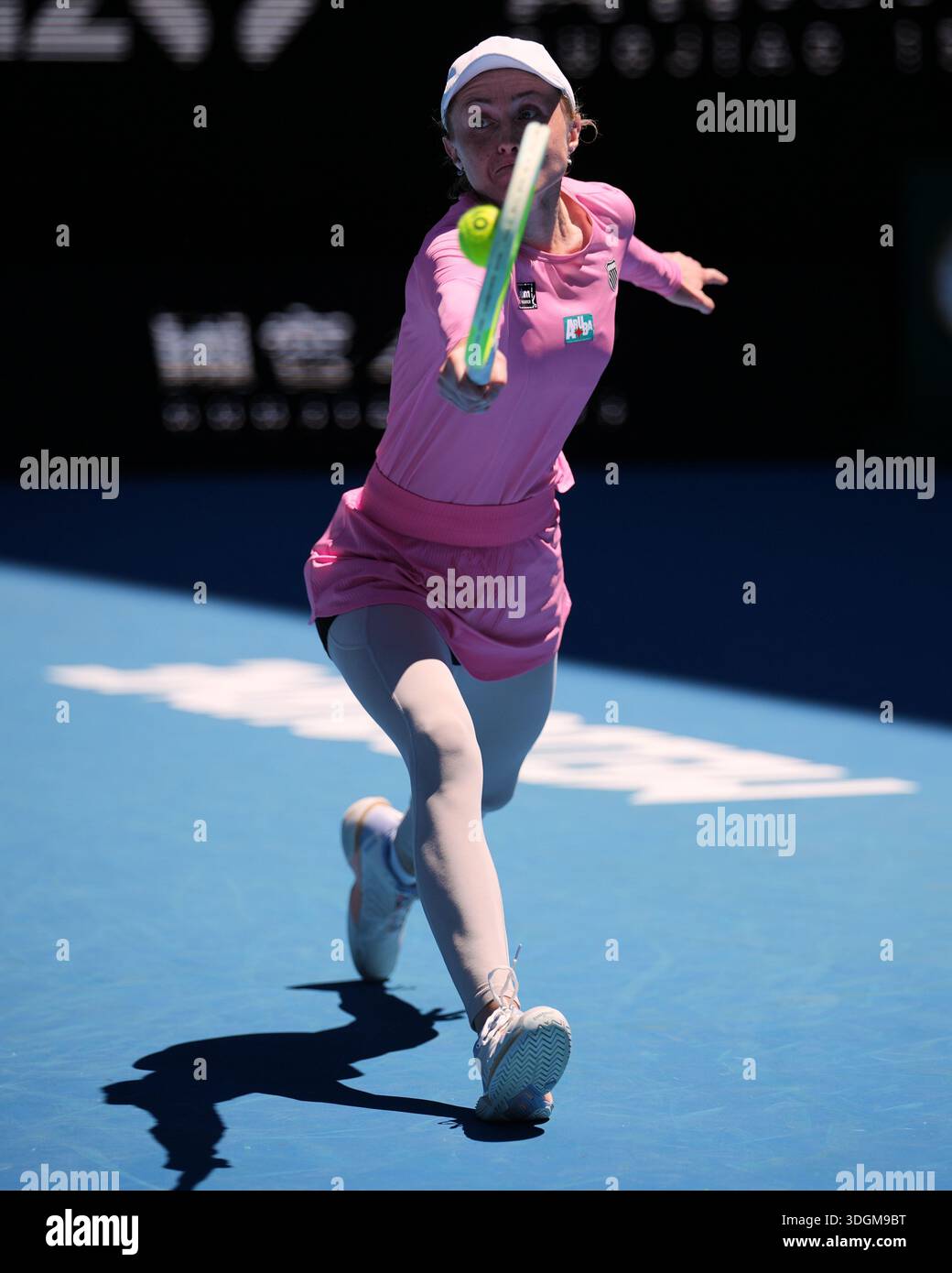 Aliaksandra Sasnovich of Belarus plays a backhand return to Jasmine ...