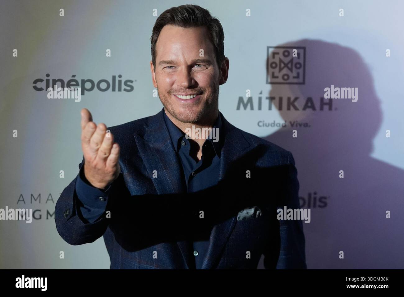 Actor Chris Pratt poses for photos at the red-carpet event for the film ...