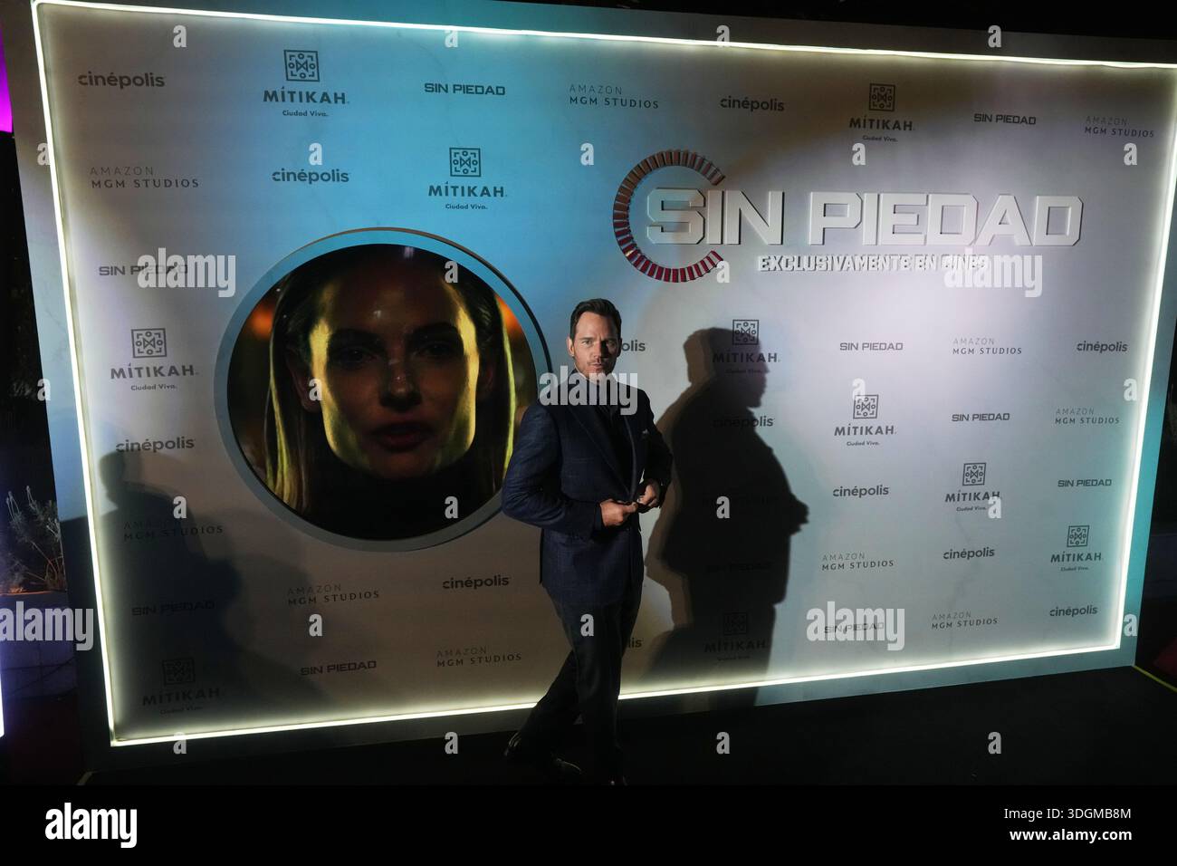 Actor Chris Pratt poses for photos at the red-carpet event for the film ...
