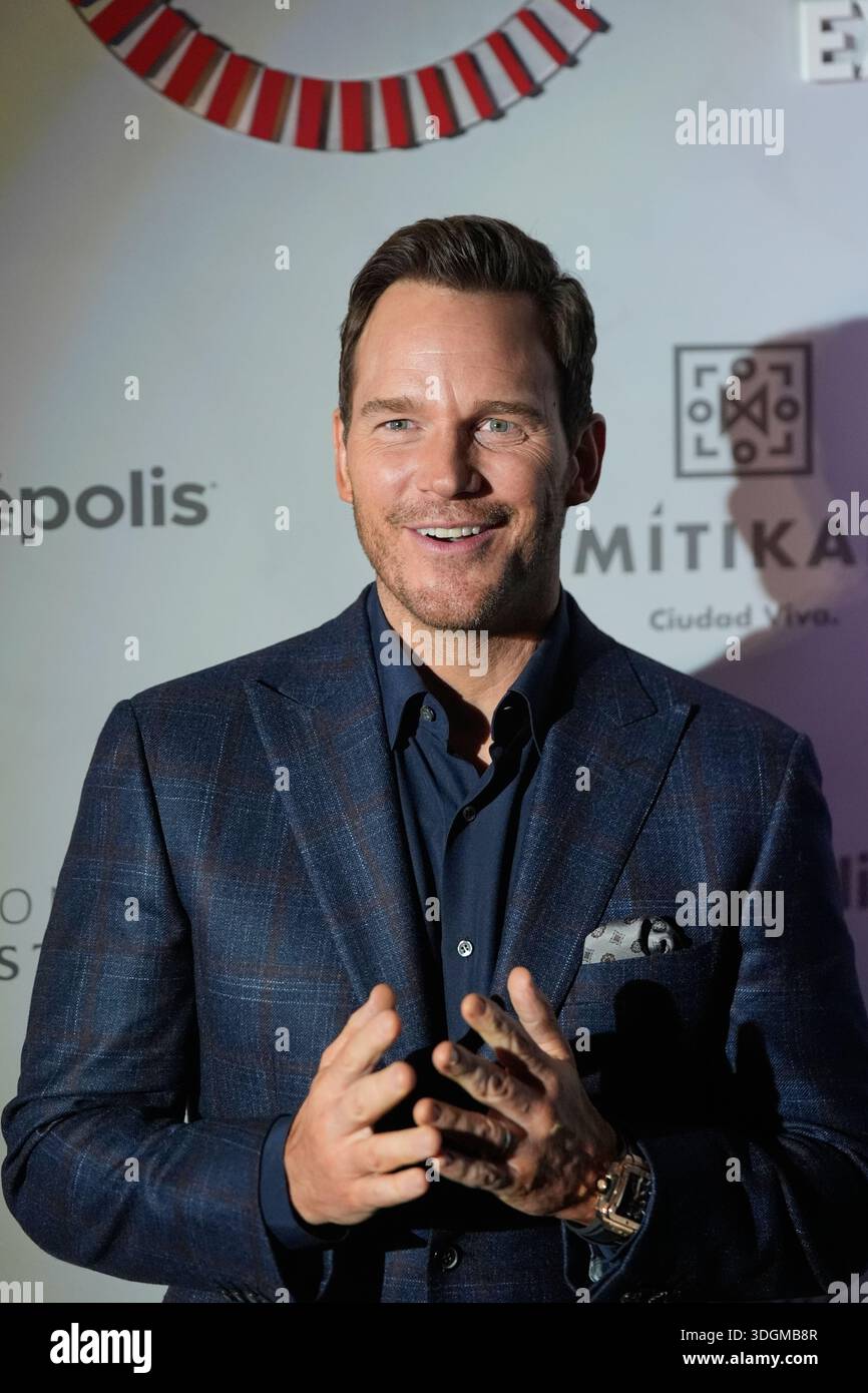 Actor Chris Pratt poses for photos at the red-carpet event for the film ...