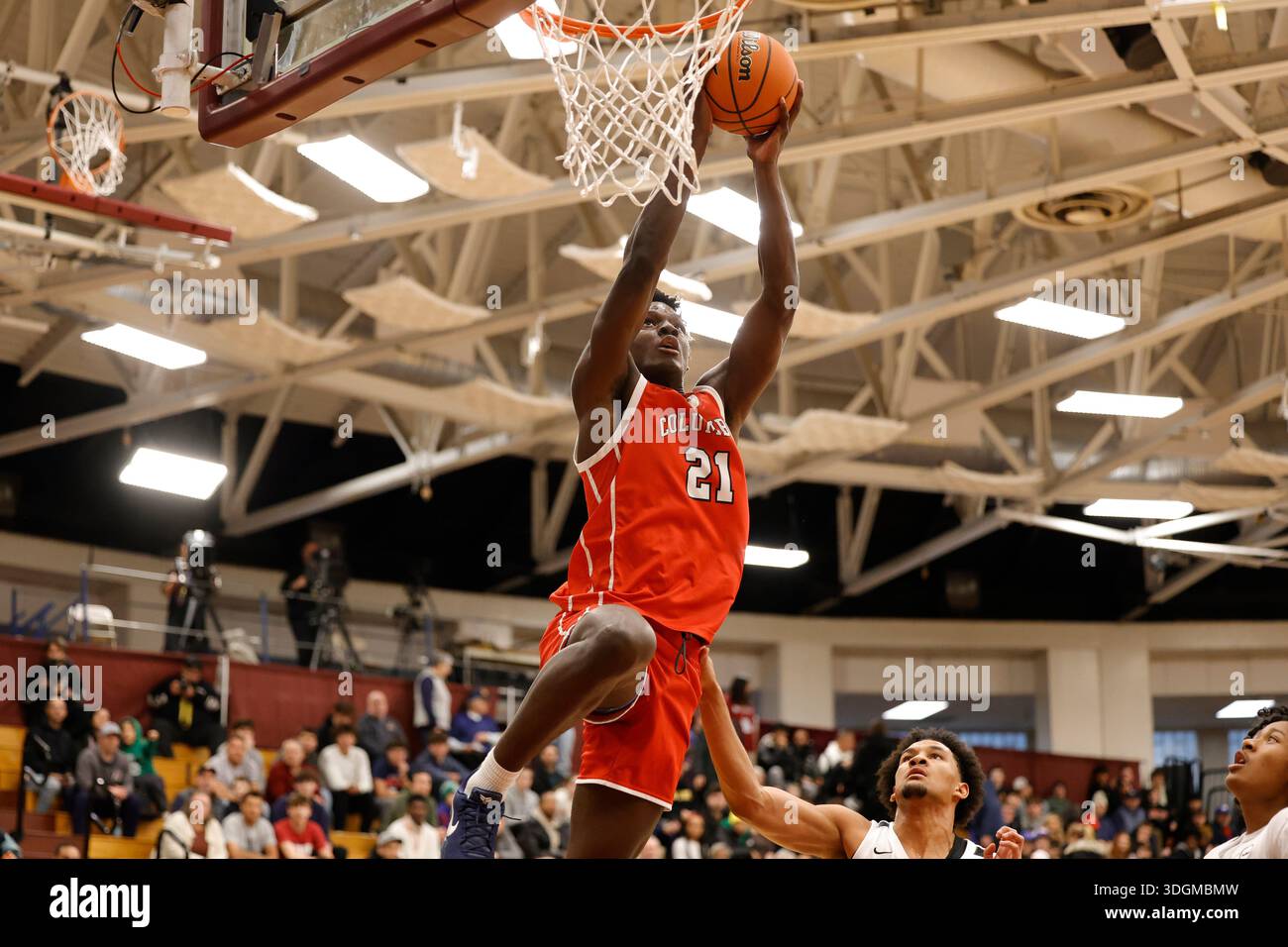 Christopher Columbus Caydin Gaskins (21) dunks an alley oop pass ...