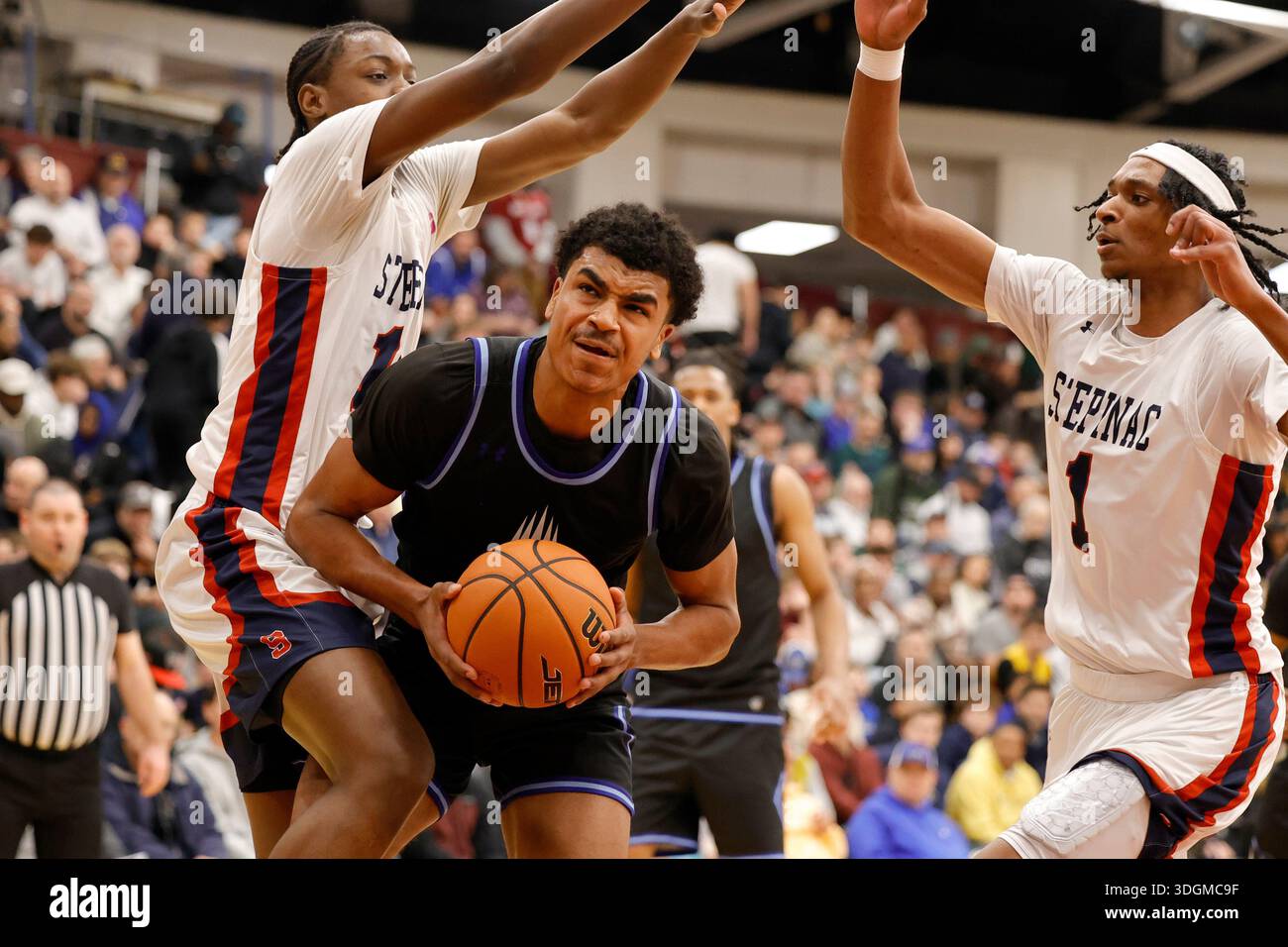 IMG Academy Aziz Olajuwon (4) in action against Stepinac during a high ...