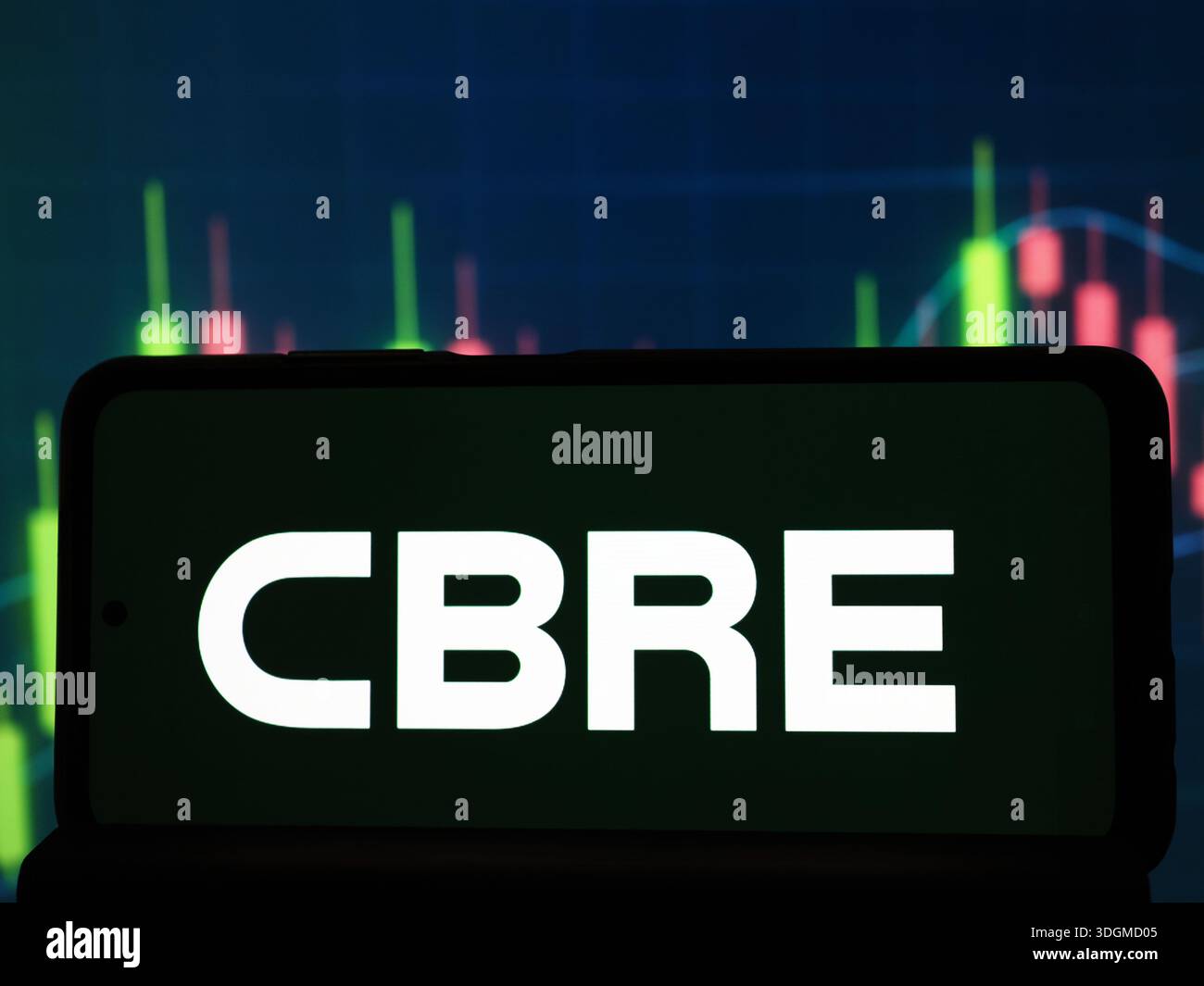 In this photo illustration, CBRE Group, Inc. logo seen displayed on a ...