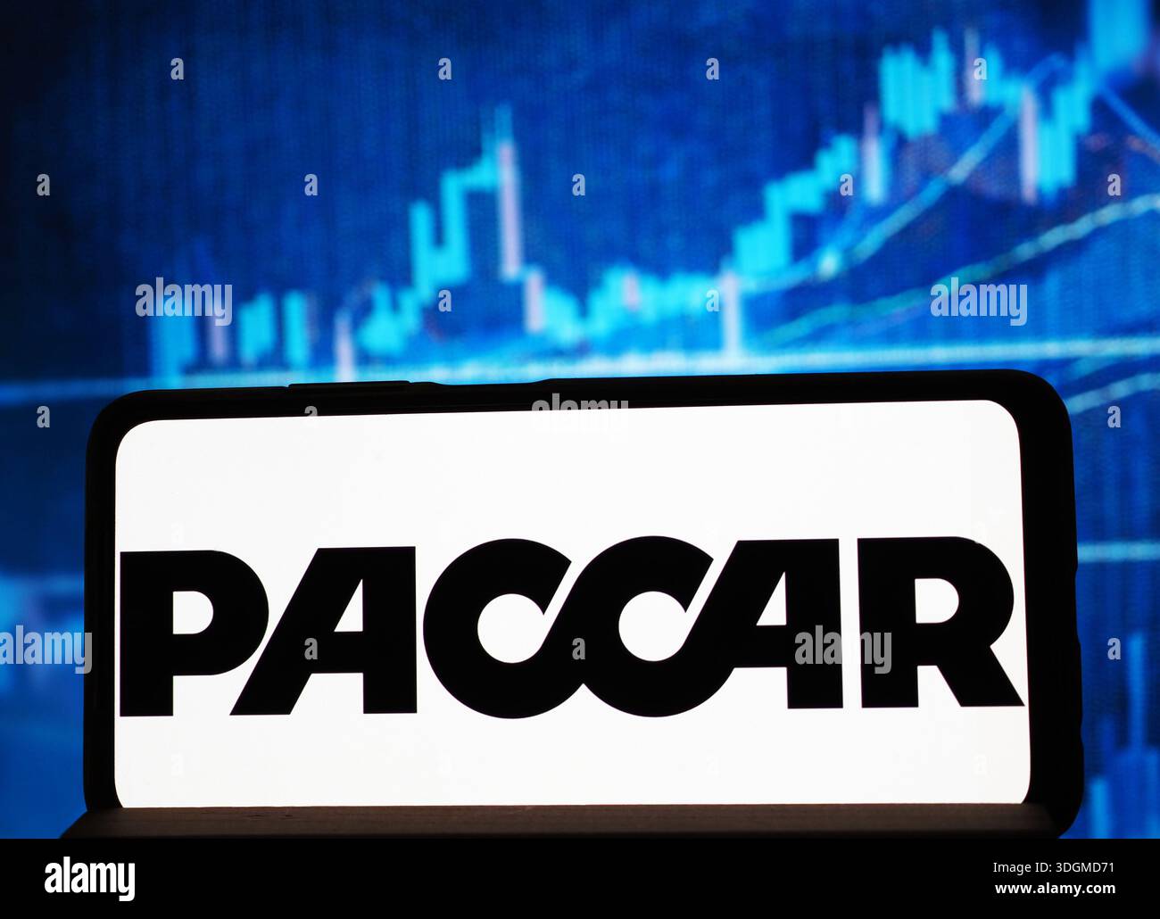 In this photo illustration, PACCAR Inc. logo seen displayed on a ...