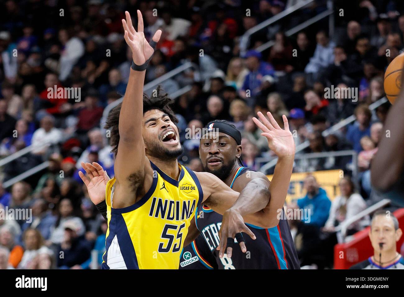 Indiana Pacers guard Ethan Thompson (55) is fouled by Detroit Pistons ...