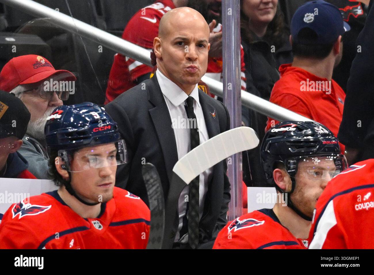 Washington Capitals head coach Spencer Carbery, center top, looks on ...