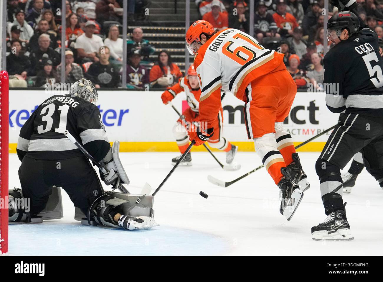 Los Angeles Kings goaltender Anton Forsberg, left, stops a shot as ...