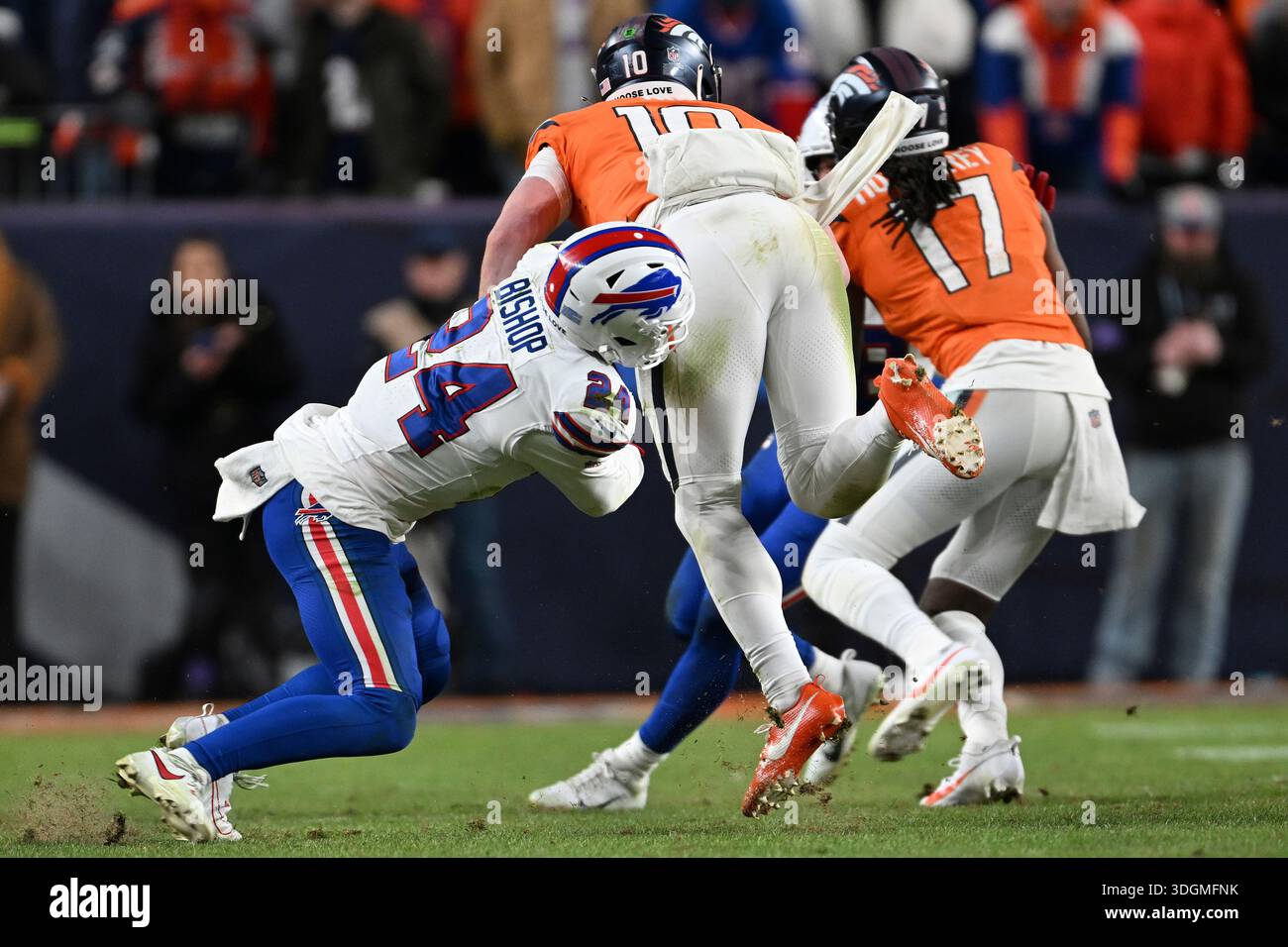 Buffalo Bills' Cole Bishop (24) hits Denver Broncos quarterback Bo Nix ...