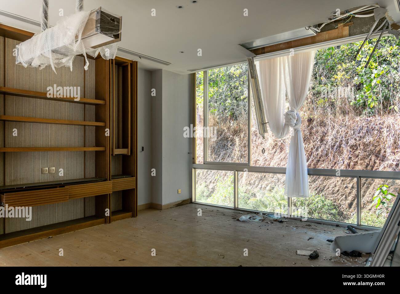 A view of an abandoned living room in a show villa at Aquarius ...