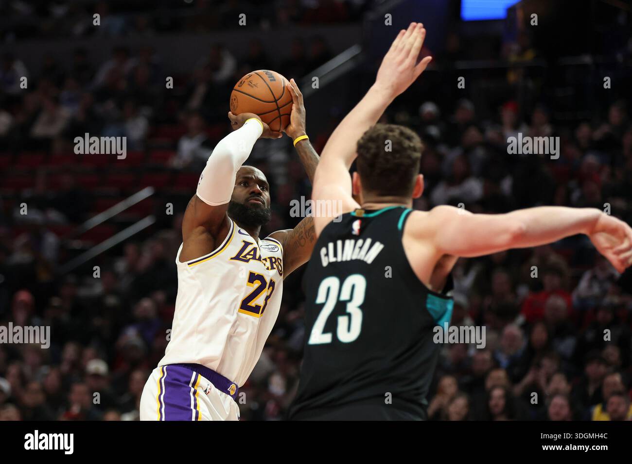 Los Angeles Lakers forward LeBron James, left, looks to shoot over ...