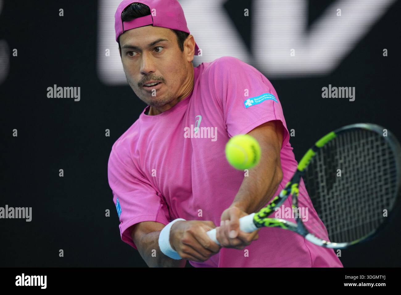 Jason Kubler of Australia plays a backhand return to Frances Tiafoe of ...