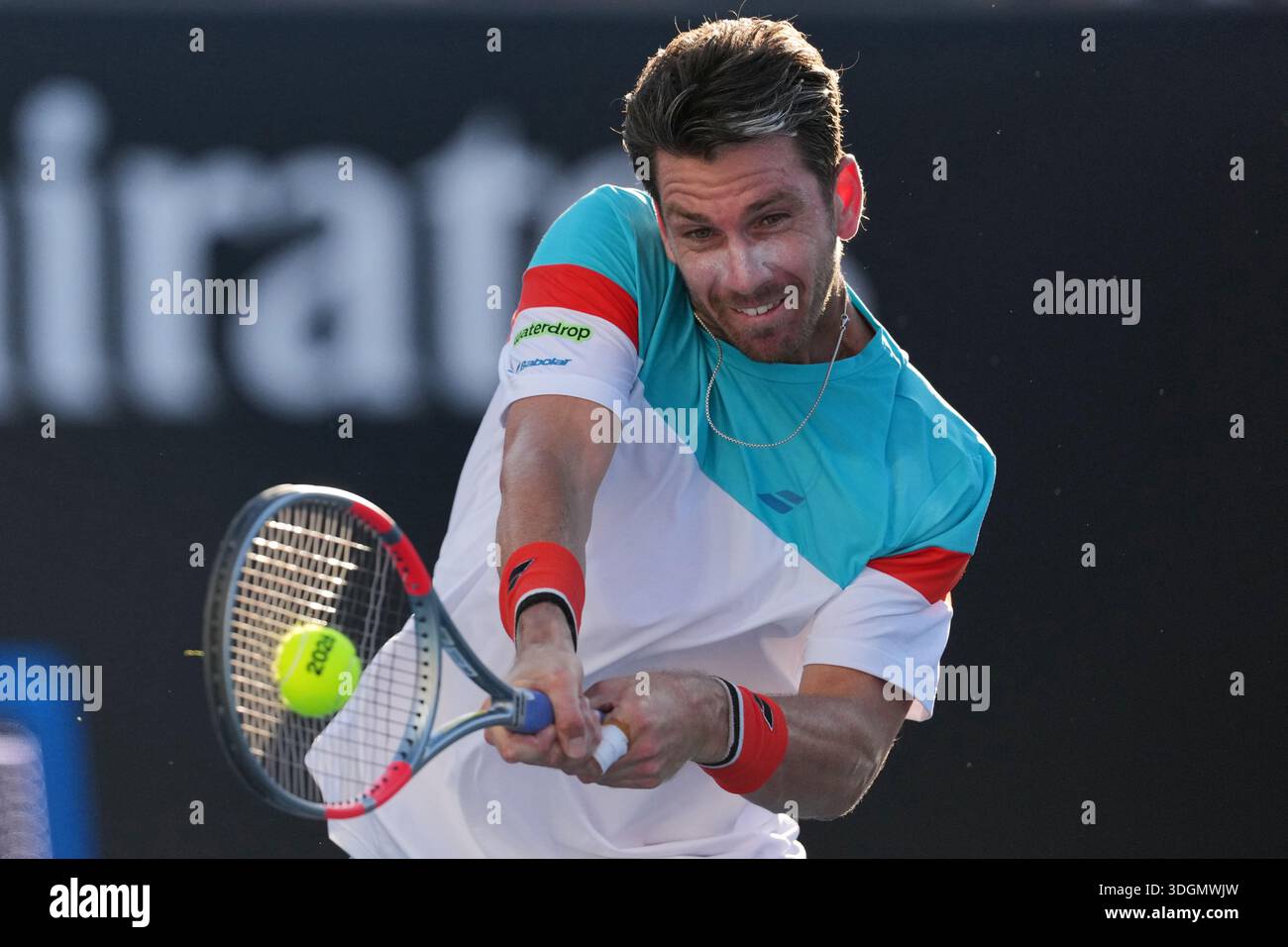 Cameron Norrie of Britain plays a backhand return to Benjamin Bonzi of ...