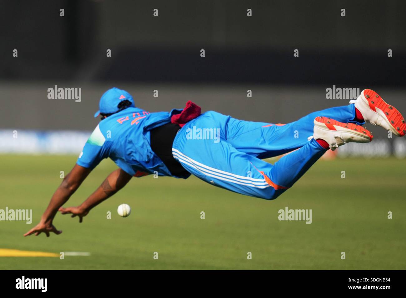 India's Harshit Rana dives to catch the ball unsuccessfully during the ...
